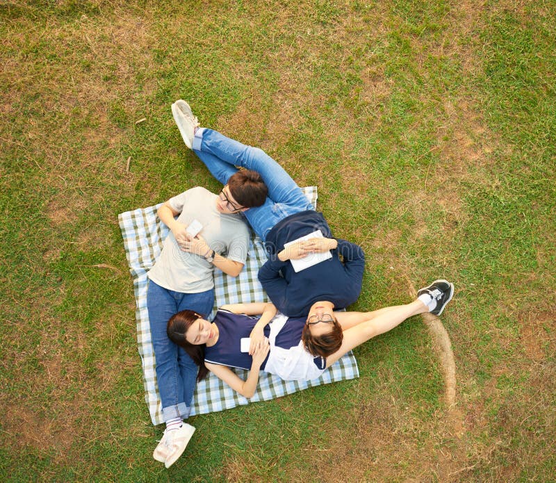 Napping in park stock image. Image of napping, together - 93540861
