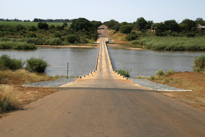 Narrow bridge over river stock photo. Image of inland - 19245810