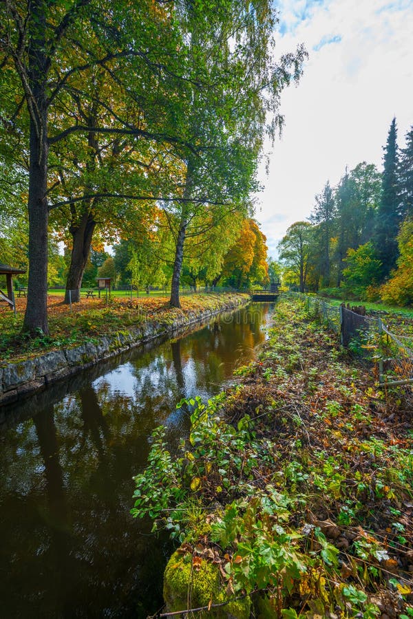 Narrow Canal in a Park at Fall.. Stock Image - Image of trees, street ...