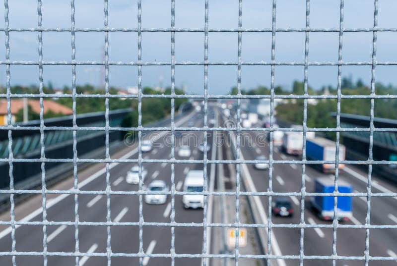 Narrow Depth of Field Looking Down from Railing Onto Busy Freeway Stock ...