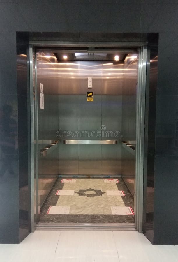 Narrow elevator space stock photo. Image of elevator - 266985656