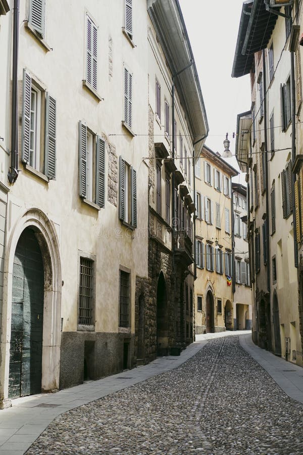 Narrow Empty Street in an Old Town Stock Photo - Image of scene ...