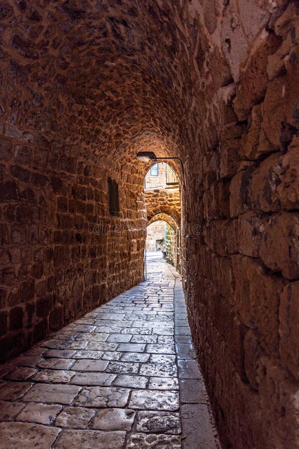 Narrow Gold Shining Passage with Shining Pavement in Akko Stock Image ...