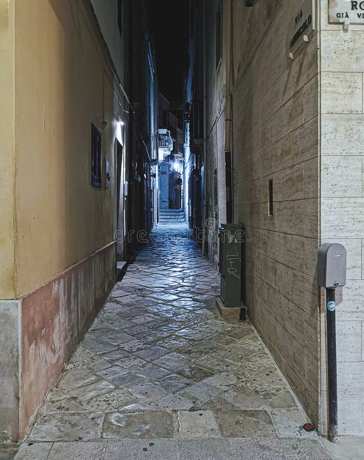 A narrow lane in Ostuni stock image. Image of strett - 196618235