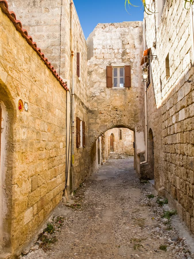 Narrow lane on Rhodes stock photo. Image of city, ancient - 46381500