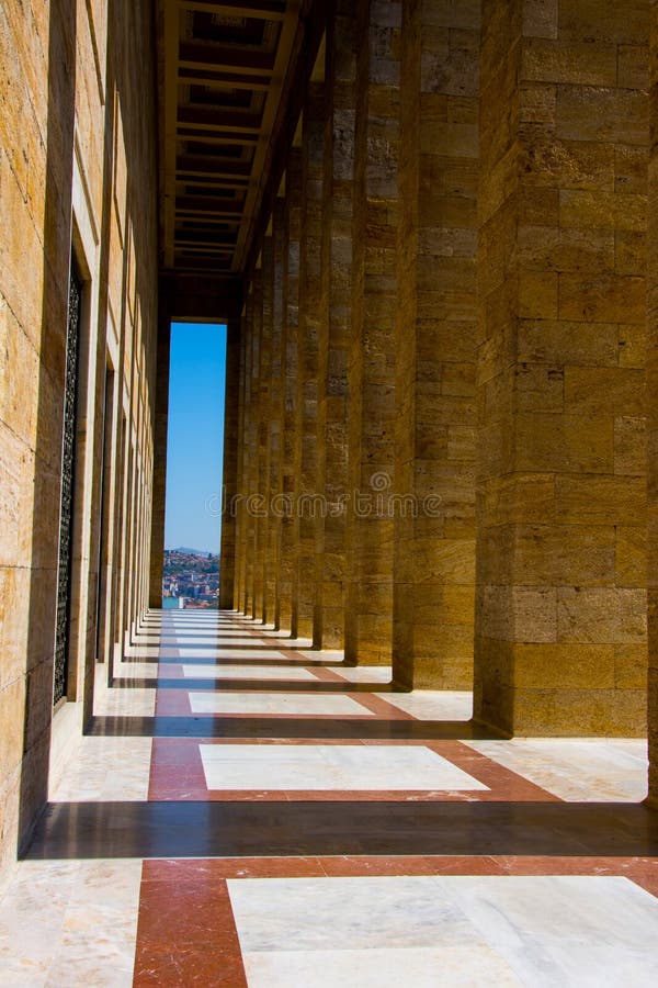 The Narrow Passage with the Pattern Columns Making Shadows Aroun Stock ...