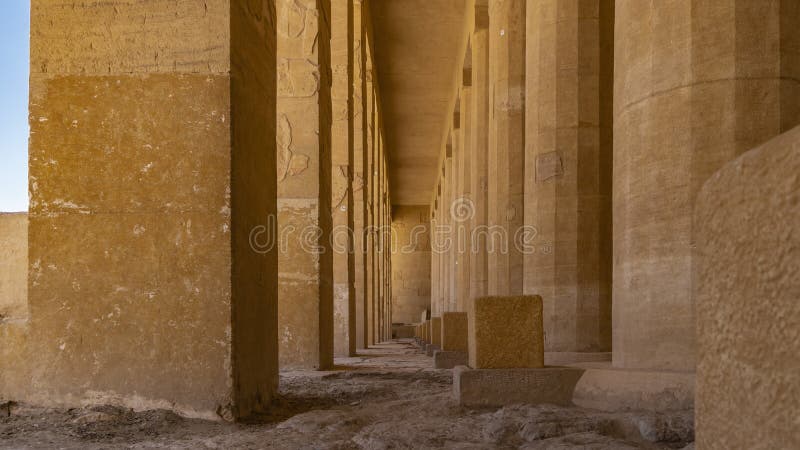 A Narrow Passage between Two Rows of Columns Leads Forward. Stock Image ...