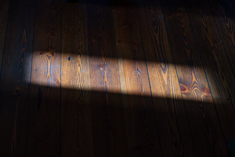 Narrow Ray of Sun on Hardwood Floor.. Stock Photo - Image of wall ...