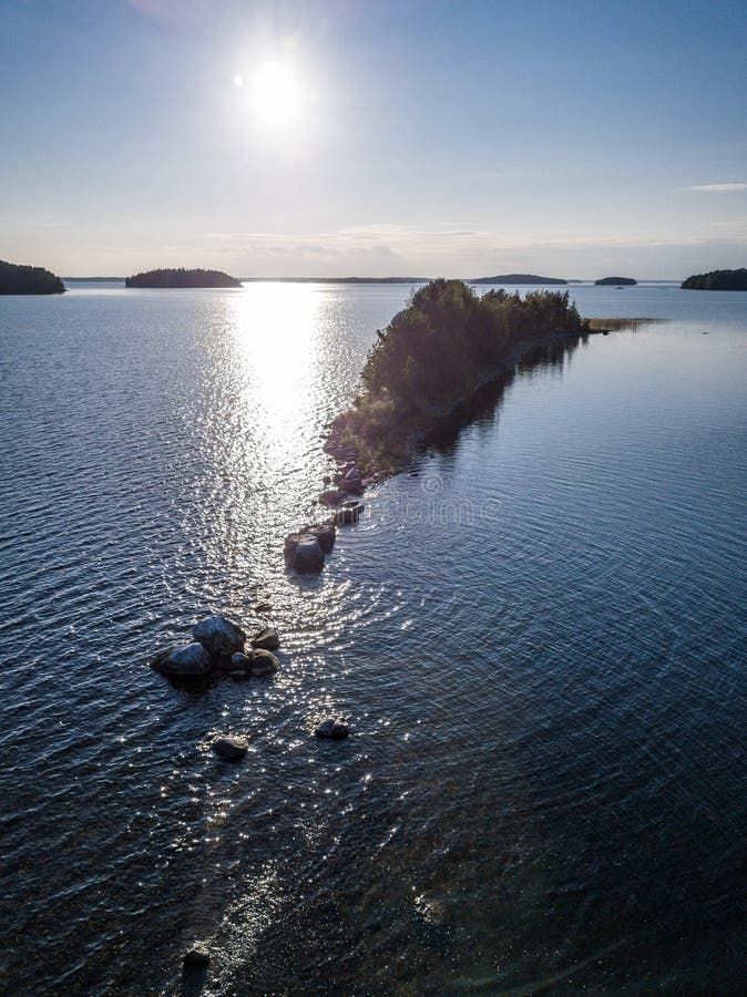 Narrow Ridge Island with Trees Stock Photo - Image of ridge, narrow ...