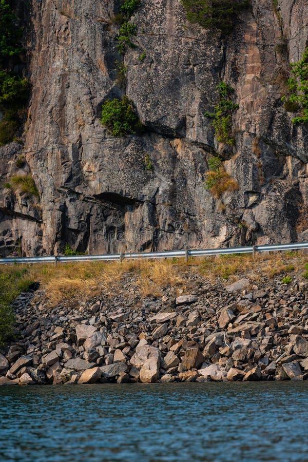 Narrow Road Built by a Steep Cliff.. Stock Image - Image of wall, cliff ...