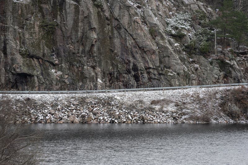 Narrow Road Carved Out of a Steep Cliffside.. Stock Image - Image of ...
