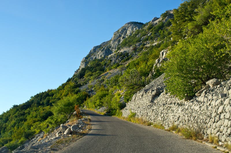 Narrow road on the slope stock image. Image of lane, bend - 35253655
