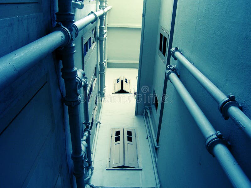 Narrow space and windows stock image. Image of caged, closing - 4745405