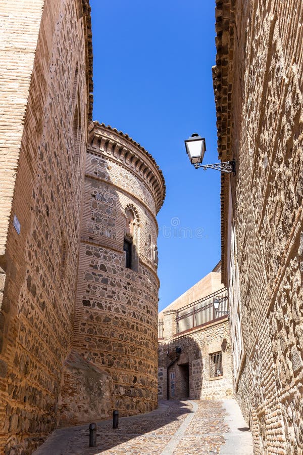 Narrow, Stone Cobbled Medieval Street with Round Facade of the Convent ... Narrow, Stone Cobbled Medieval Street with Round Facade of the Convent ...