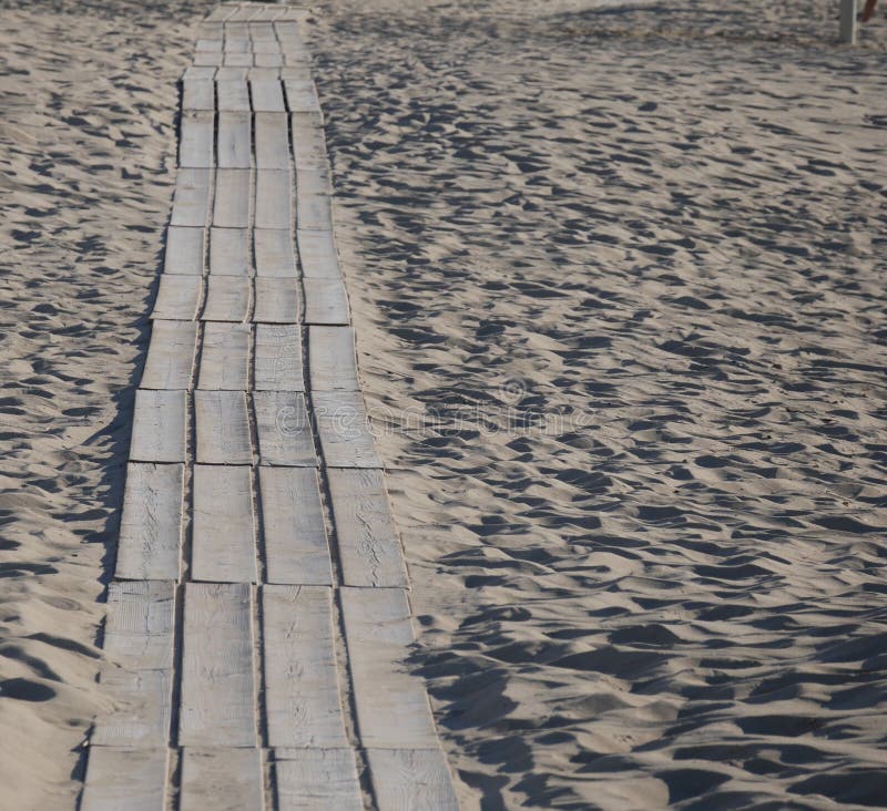 Narrow Stone Pathway on a Sandy Beach Stock Image - Image of landscape ...