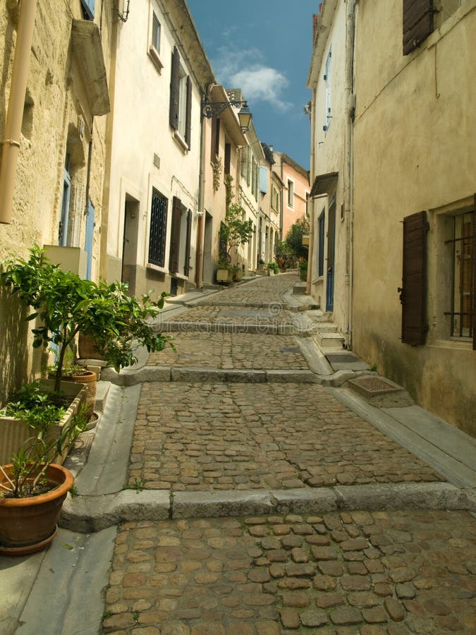 Narrow Street in French Town Stock Photo - Image of cobbled, road: 5428454