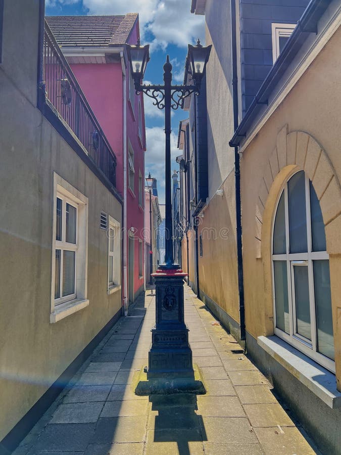 Narrow Street in an Irish City. Pillar in the Middle of the Street ...