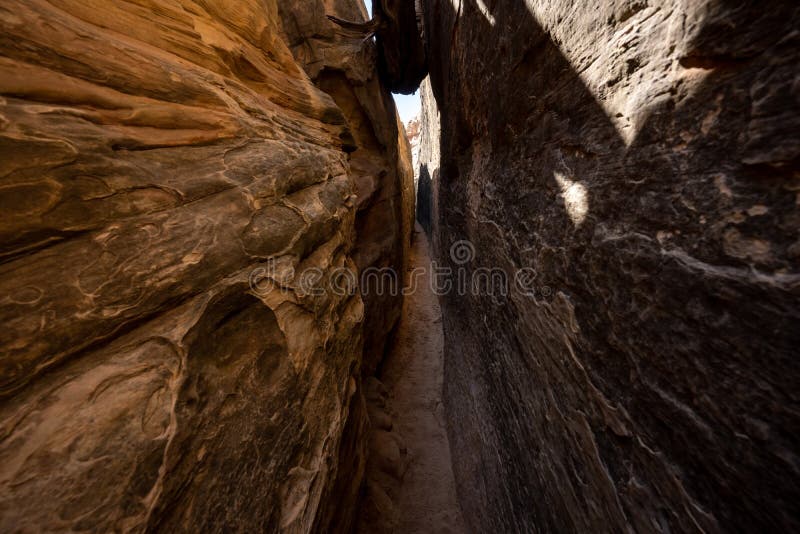 Narrow Trail and Tree Trunk Wedged between the Cliffs of the Joint ...