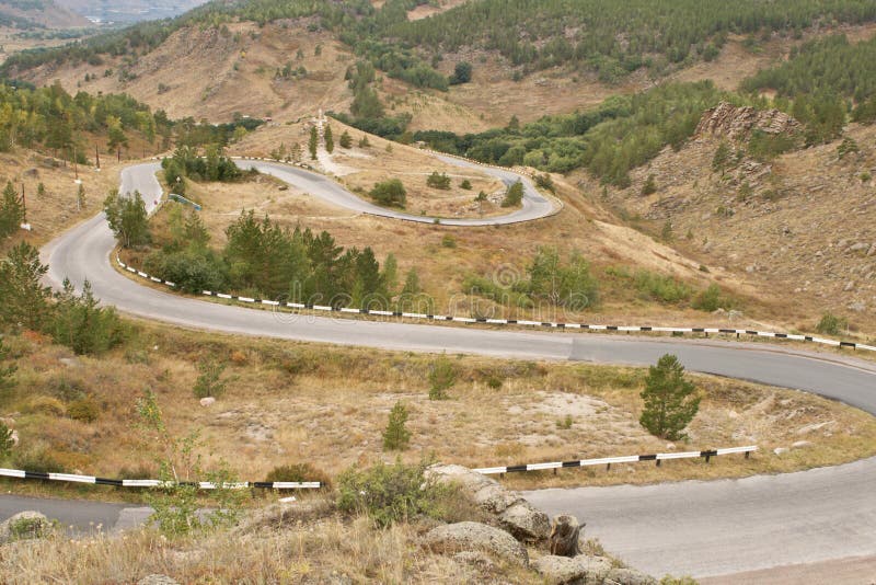 Narrow twisting road stock image. Image of range, horizontal - 19191369