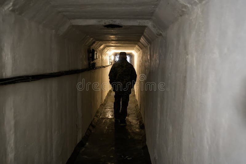 Narrow Underground Corridor Connecting Surface Facilities To the ...