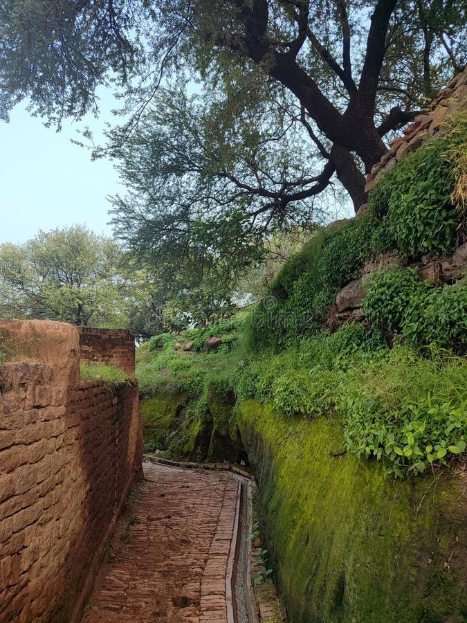 A Narrow Way Crossing Rocks and Old Houses Stock Photo - Image of ...