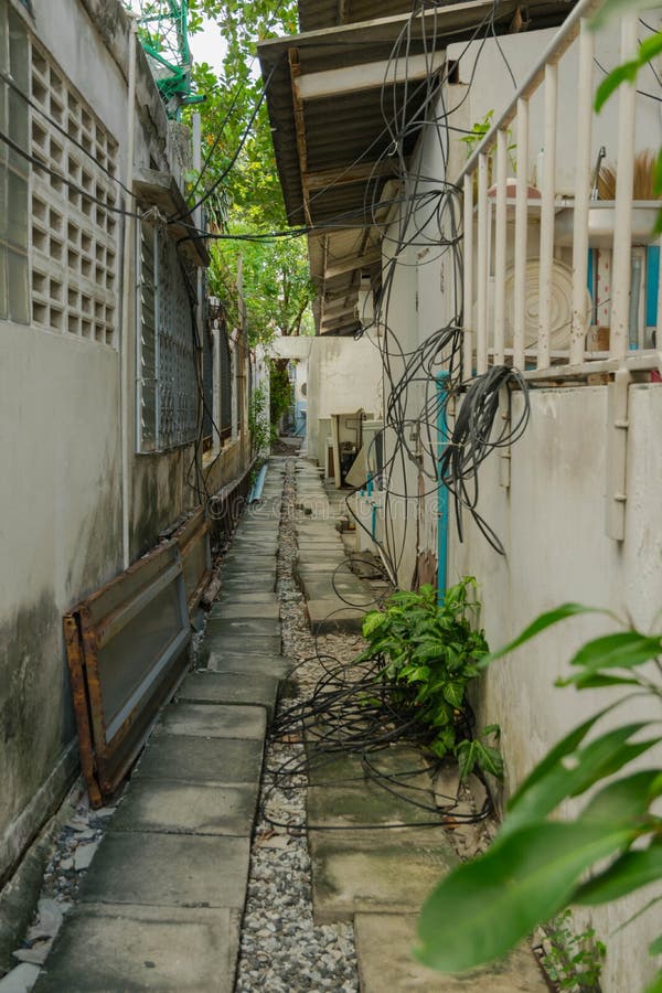 Narrow way stock image. Image of ragged, cable, door - 82501309