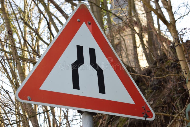 Narrowing street sign stock photo. Image of narrowing - 241212112