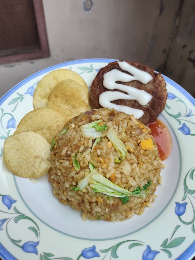 Nasi Goreng, Fried Rice with Chicken and Egg in Indonesia Style. Asian ...