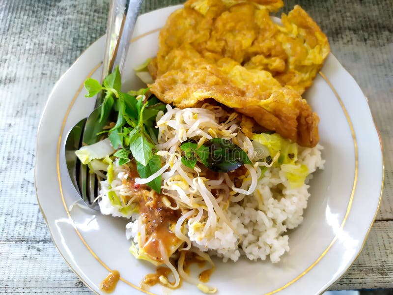 Nasi Pecel is a Typical Breakfast Dish in Java Stock Photo - Image of ...