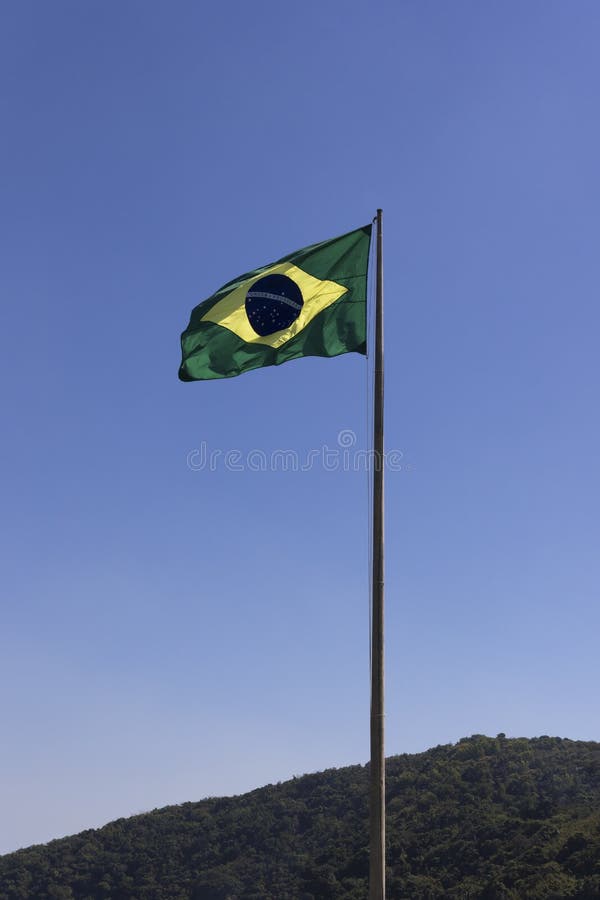 The National Flag of Brazil in Blue Sky Background Stock Image - Image ...