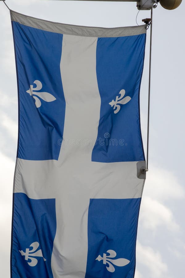 National Flag of Quebec on a Flagpole Flutering on Wind Stock Image ...