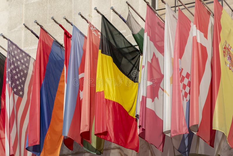 National Flags of Different Countries Hang from the Facade of the ...