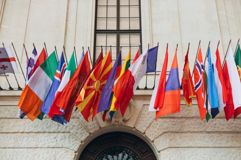 National Flags of Various Countries Flying in the Wind. Colorful Flags ...