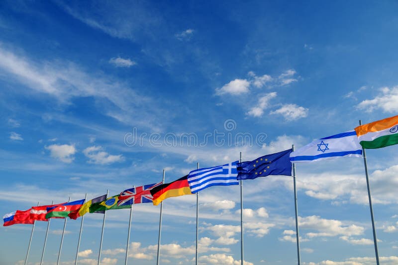 National Flags of Various Countries Flying in the Wind. Sky Stock Image ...