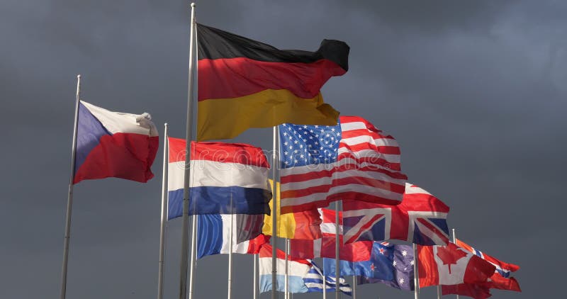 National Flags Waving in the Wind Stock Video - Video of coloured ...