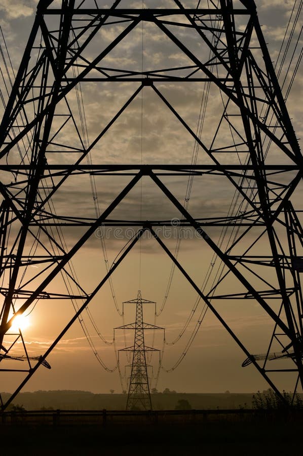 National Grid Electricity Pylon Tower Silhouette Framing Distant Pylons ...