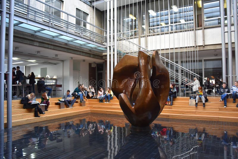 The National Library with a Brown Sculpture in the Center of the Hall ...