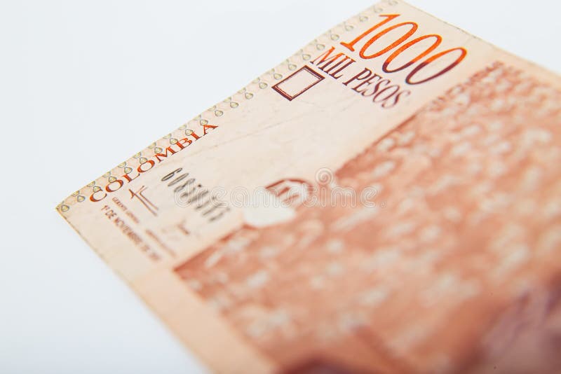 Colombiansk peso i mitt fotografering för bildbyråer. Bild av bank ...