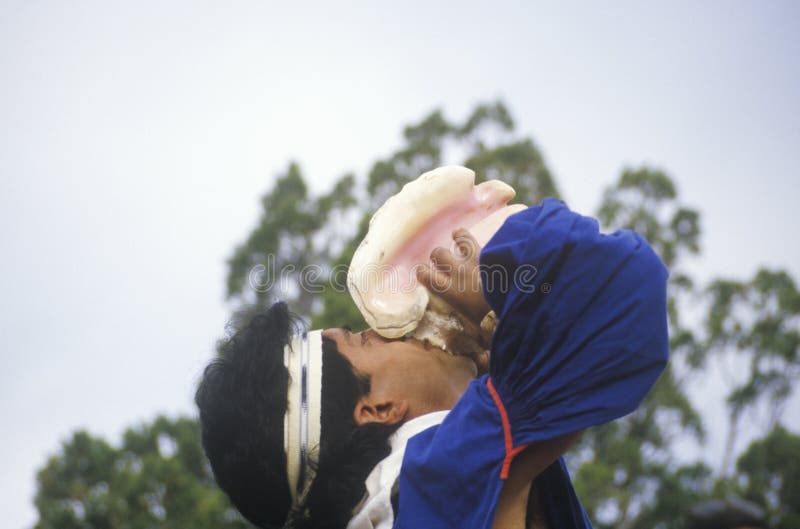 Native American Blowing into Conch Shell Editorial Photography - Image ...