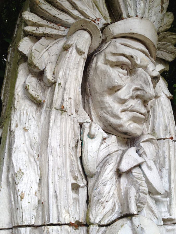 Native American Figure Carved into Stone Stock Photo - Image of ...