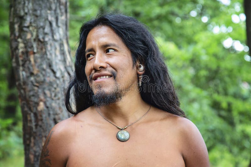 Native American Man in the Forest with a Necklace Stock Photo - Image ...