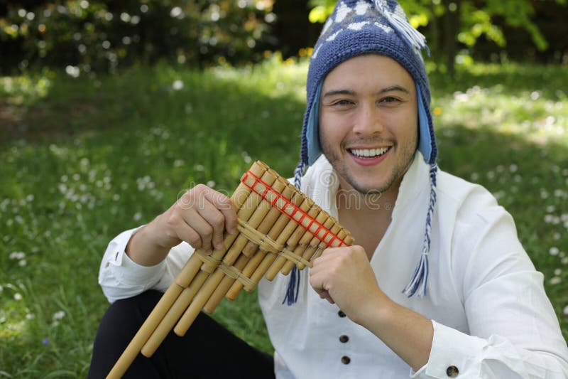 Native American Man Playing a Wooden Flute Stock Photo - Image of ...