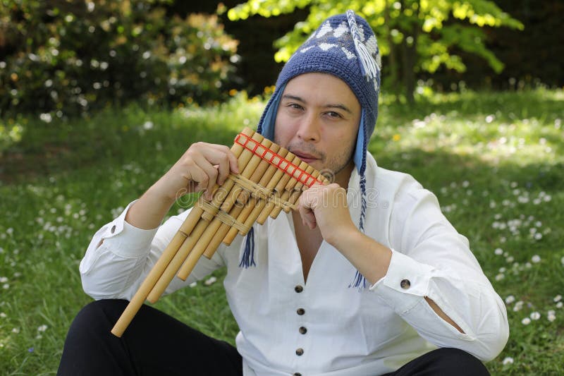 Native American Man Playing a Wooden Flute Stock Image - Image of flute ...