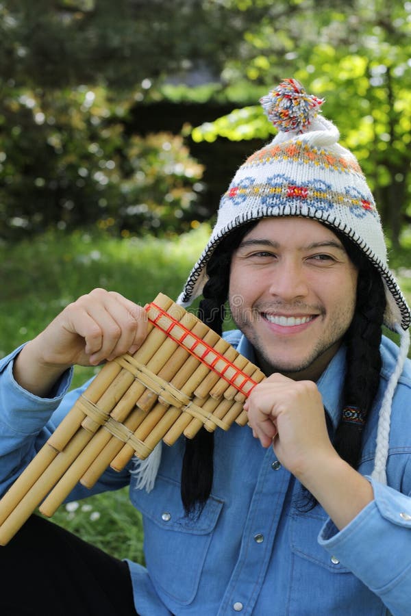 Native American Man Playing a Wooden Flute Stock Photo - Image of peru ...