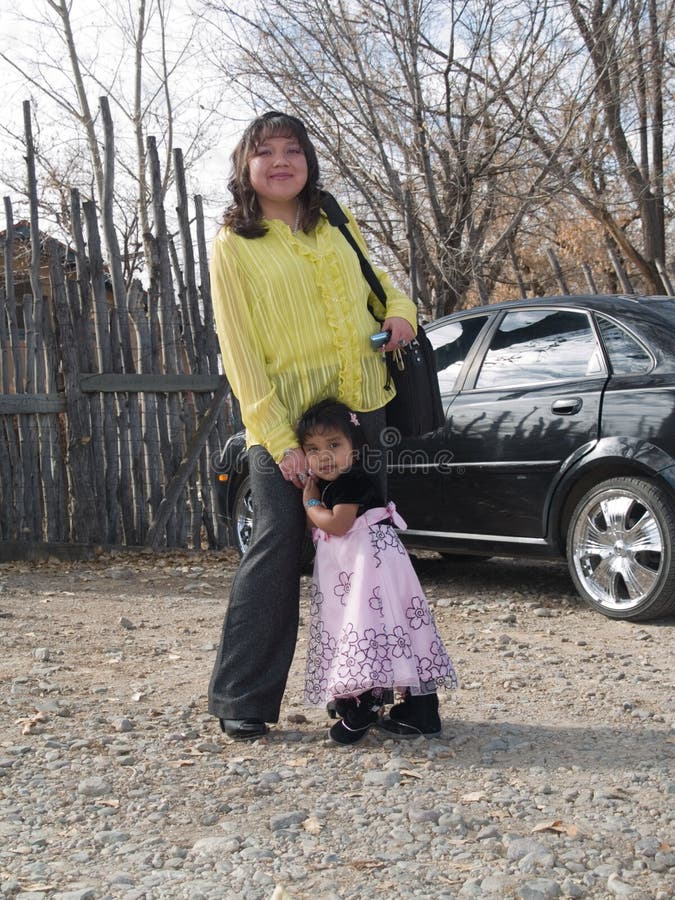 Native American Woman with Her Daughter Stock Image - Image of fence ...