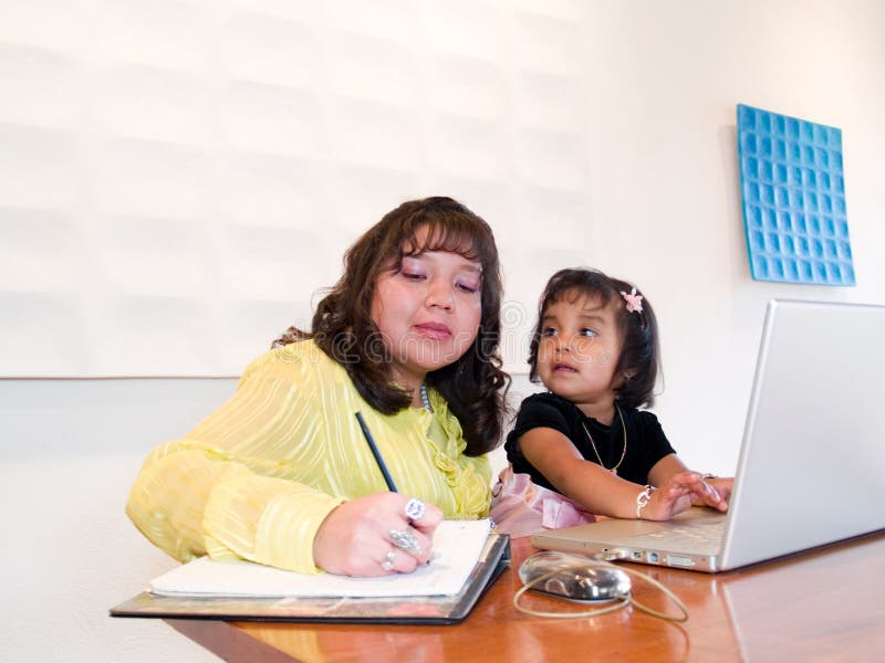 Native American Woman at Work with Child Stock Photo - Image of office ...