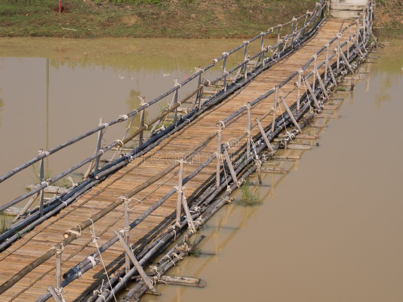 Native Bridge Made of Bamboo and Wood Stock Photo - Image of brook ...