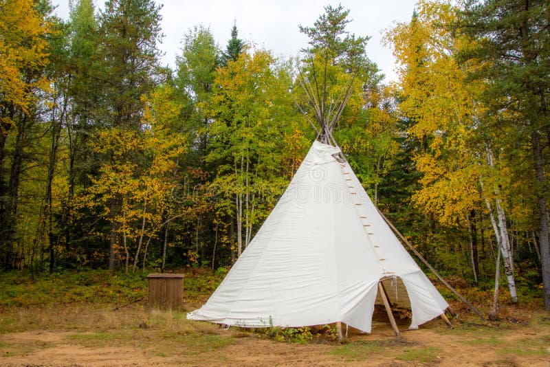 Teepee in forest stock photo. Image of rustic, domicile - 13561328