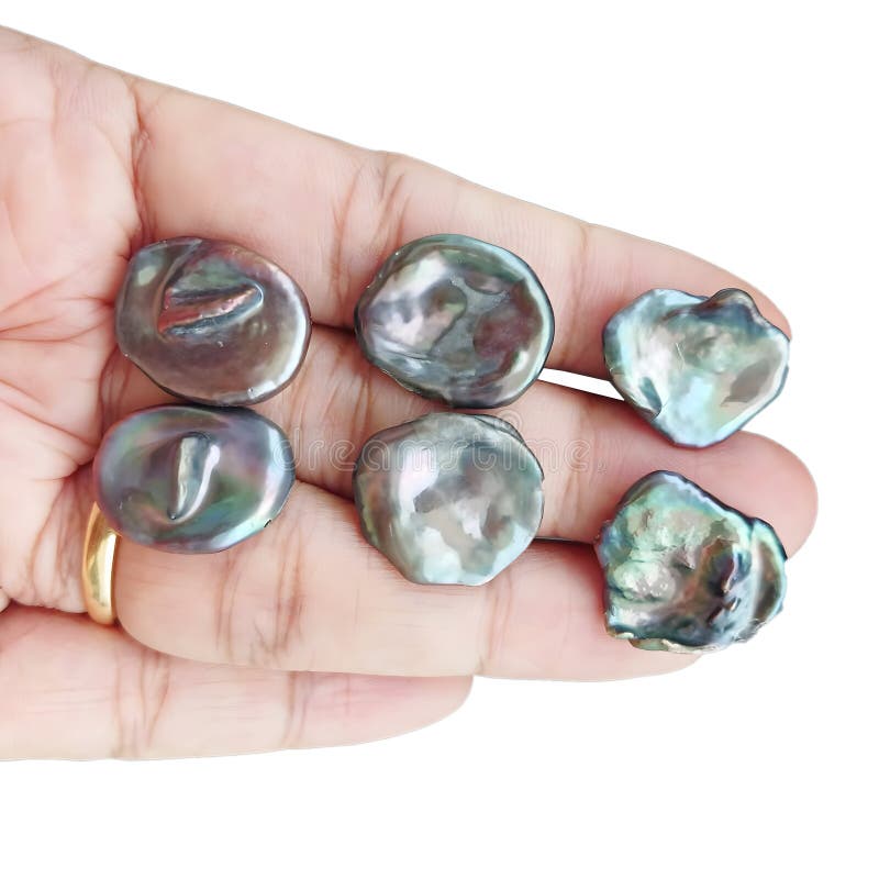 Natural Abalone Shell Pearls Held in a Hand Display Stock Image - Image ...