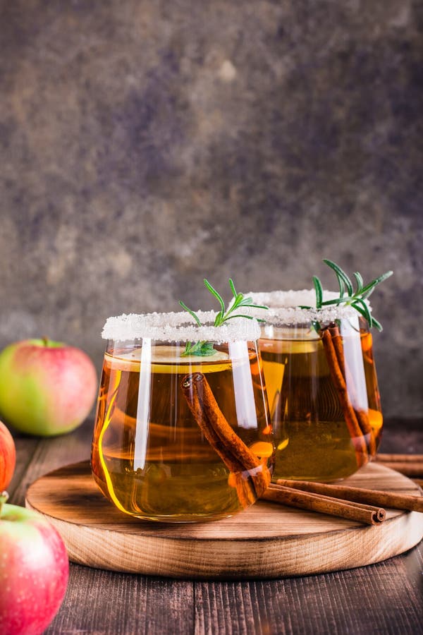 Natural Apple Cider with Cinnamon in Glasses on the Table. Homemade ...